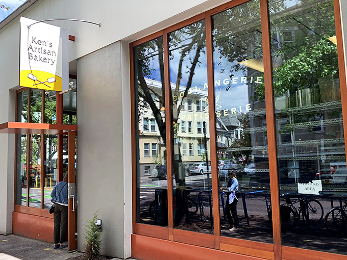 The unassuming exterior of Ken's Artisan Bakery hides Portland's bread paradise. Like finding a Michelin star in a strip mall, the yellow sign beckons carb enthusiasts daily. 