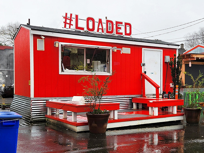 The bright red food cart with "#LOADED" emblazoned on top isn't just a name&mdash;it's a promise that's gloriously kept with every order.