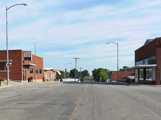 Main Street Alma whispers stories in limestone and light. The golden hour transforms these historic buildings into a postcard from a gentler time.