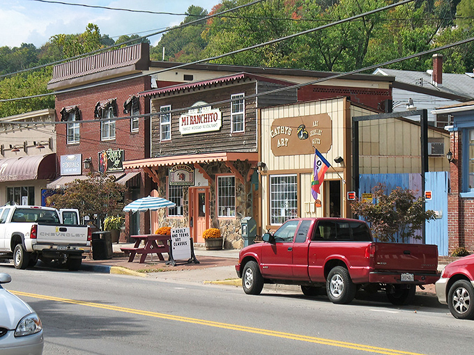 Main Street charm that feels like stepping into a Norman Rockwell painting, complete with vintage cars and storefronts that whisper stories of simpler times.