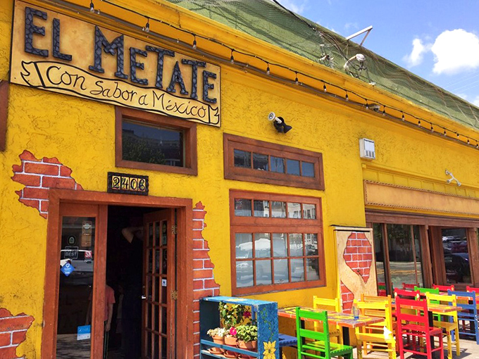 That sunshine-yellow exterior isn't just a building&mdash;it's a mood-altering device that says "happiness served daily." The colorful chairs outside are just a preview of the fiesta within.
