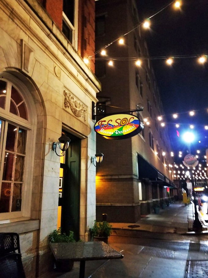 El Sol's modest storefront belies the culinary treasures within. Those string lights aren't just decoration&mdash;they're beacons guiding hungry souls to enchilada nirvana.