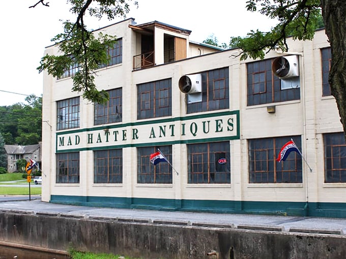 A classic red Volkswagen Beetle parked outside Mad Hatter's striking white facade&mdash;like a cherry on top of this multi-layered sundae of nostalgia. 