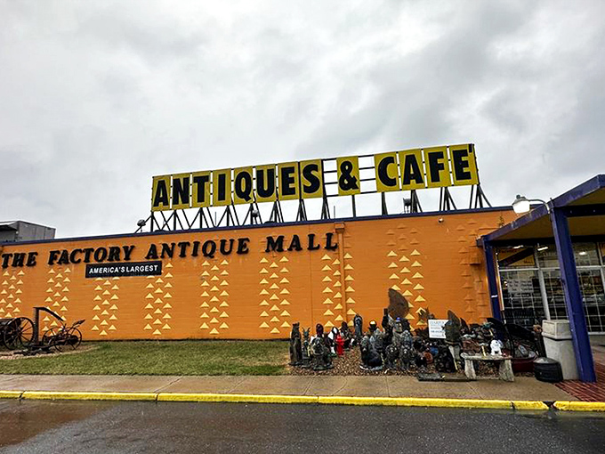 The unmistakable bright orange exterior announces itself like a vintage billboard come to life. America's largest antique mall isn't shy about its superlative status!