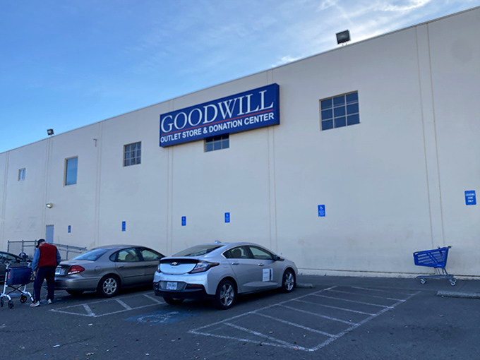 The unassuming exterior hides a treasure hunter's paradise within. Like finding a secret level in a video game, but with vintage sweaters instead of power-ups.