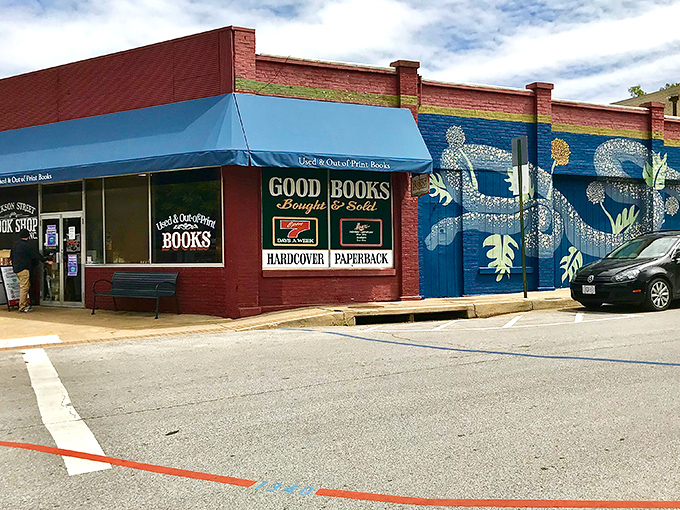 The vibrant red and blue exterior of Dickson Street Bookshop stands like a literary oasis in Fayetteville, promising adventures between covers rather than passport stamps.