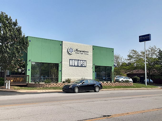 The distinctive green and white exterior of Morgenstern's stands like a beacon for book lovers, promising literary treasures within its welcoming walls.