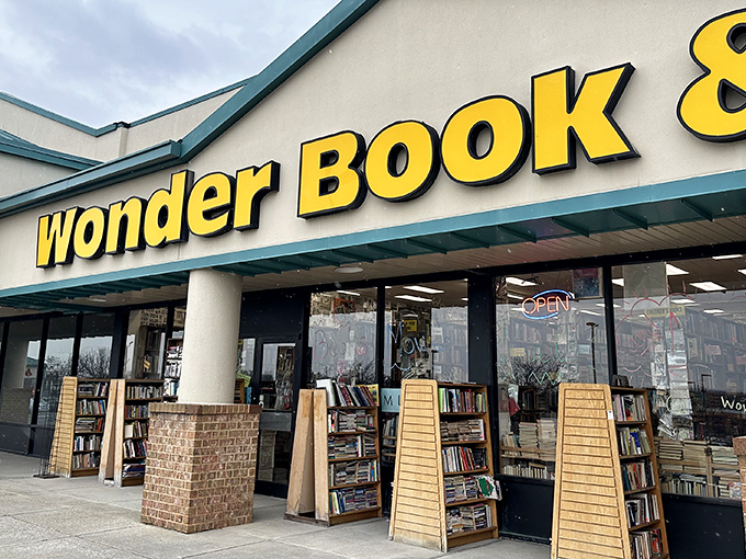 The bright yellow sign of Wonder Book beckons like a literary lighthouse, promising treasures within for the curious and book-hungry.