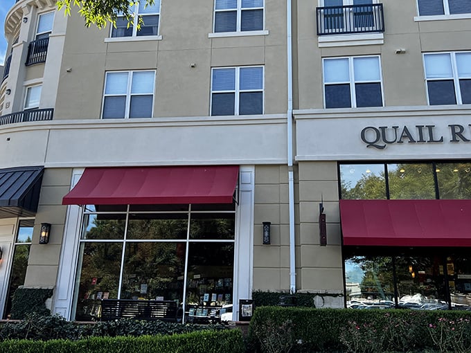 The distinctive burgundy awnings of Quail Ridge Books beckon bibliophiles to this literary sanctuary nestled in Raleigh's North Hills district.