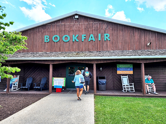 The rustic barn exterior of Green Valley Book Fair beckons bibliophiles like a literary siren song. Those rocking chairs aren't just for show&mdash;they're recovery stations for overwhelmed book hunters.