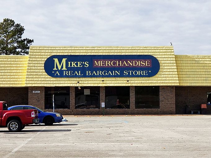 The unassuming yellow facade of Mike's Merchandise promises what the sign boldly declares: "A REAL BARGAIN STORE." Understatement of the century!