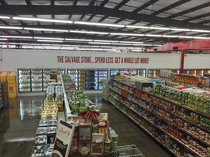 The bright red exterior of The Salvage Store stands out like a beacon for bargain hunters, promising treasure inside those unassuming walls.