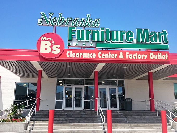 The iconic red and green sign of Mrs. B's stands like a beacon of hope for bargain hunters across Nebraska.