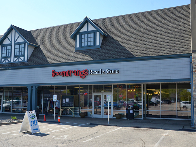 The Tudor-style exterior of Boomerangs beckons with its distinctive blue trim and red signage—a portal to bargain-hunting adventures within.