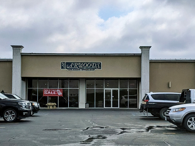 The unassuming exterior of Arwood's Furniture & Mattress hides a wonderland within, like finding a five-star restaurant in a gas station.