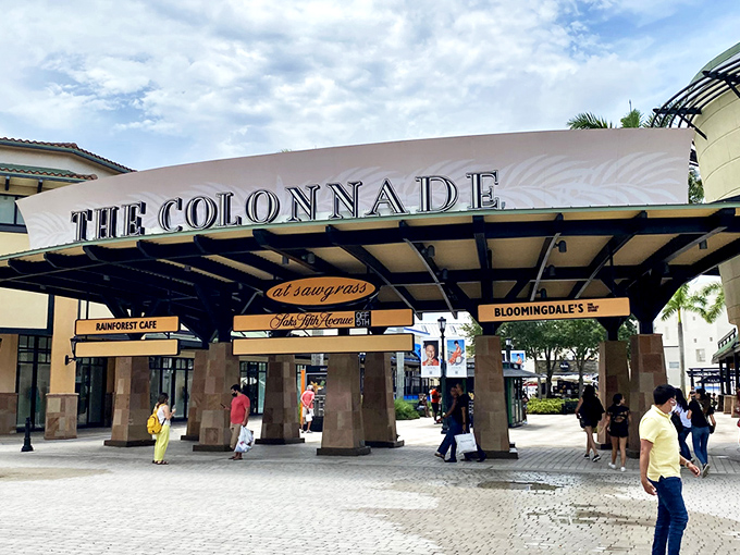 Palm trees frame the entrance to Sawgrass Mills like nature's own welcome committee. Florida shopping doesn't get more iconic than this retail oasis.