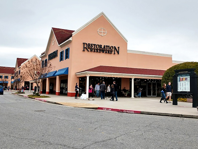 Restoration Hardware's elegant storefront beckons with promises of discounted luxury. Who knew saving money could look this sophisticated?