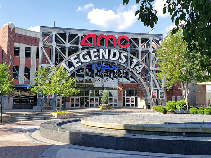 The grand entrance to Legends Outlets welcomes bargain hunters with architectural flair and a promise of retail adventure that won't require a second mortgage.