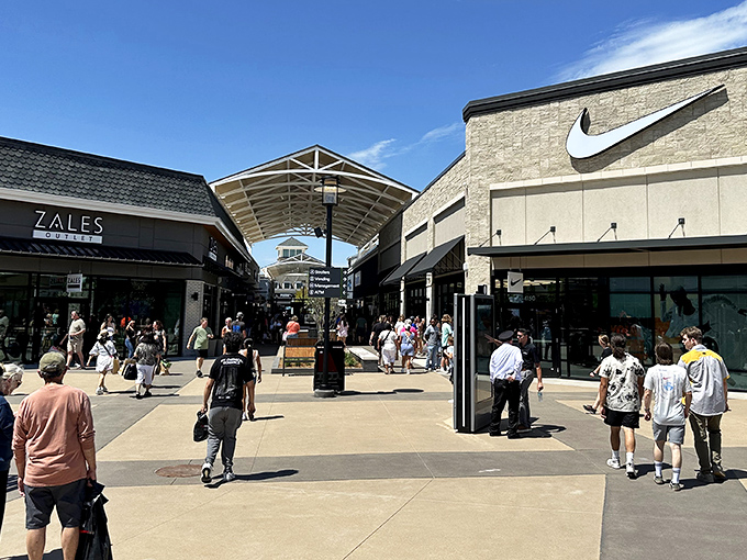The modern façade of Tulsa Premium Outlets welcomes bargain hunters with its clean lines and inviting walkways—retail therapy's promised land in Jenks.