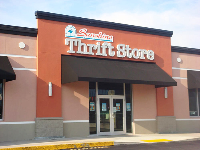 The coral-colored facade with its iconic flamingo logo promises treasure hunting adventures within. Florida thrifting at its most inviting! 