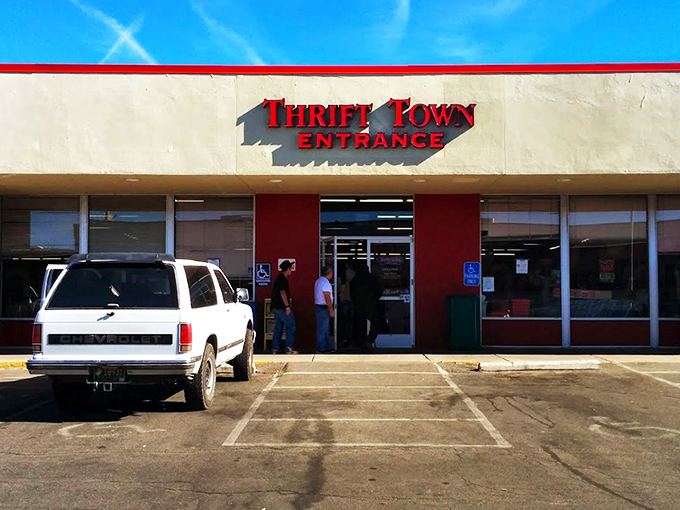 The iconic Thrift Town storefront beckons treasure hunters with its bold red signage, promising adventures that last longer than most Netflix binges.