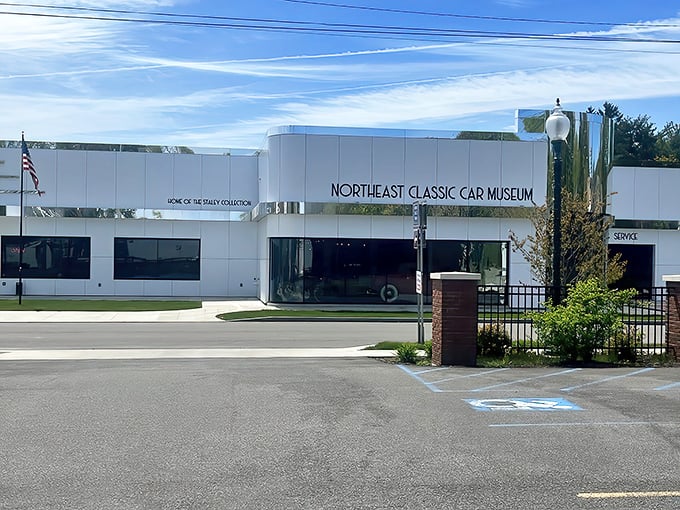 The sleek white exterior of the Northeast Classic Car Museum in Norwich belies the colorful automotive treasures waiting inside, like finding the Louvre in a small-town strip mall.