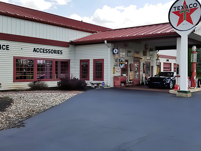 The vintage Texaco gas station fa&ccedil;ade welcomes visitors like a portal to America's automotive golden age, complete with those iconic red pumps.