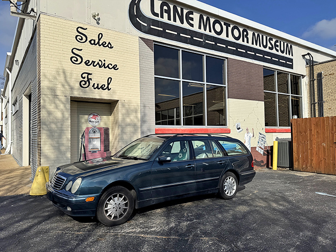 The unassuming exterior of Lane Motor Museum, where automotive dreams hide behind a vintage bakery facade. Who knew bread and bizarre vehicles had so much in common?