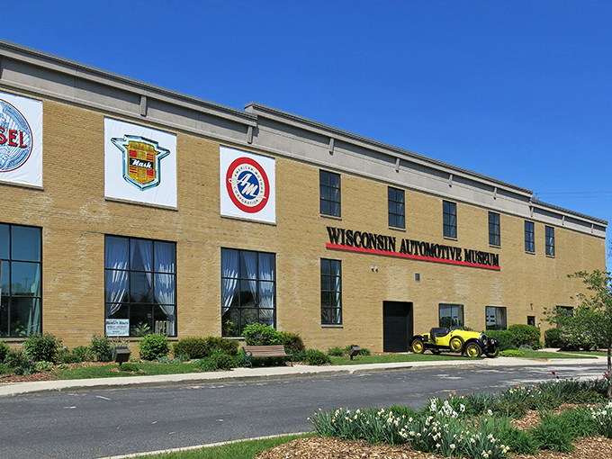 The Wisconsin Automotive Museum's exterior proudly displays its automotive heritage with vintage car logos. Like finding a treasure chest of chrome and nostalgia in Hartford's backyard.