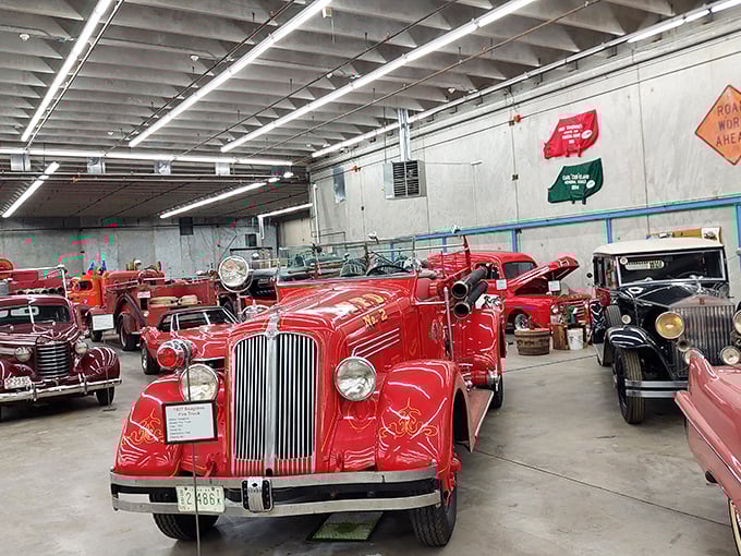 Knight Rider meets firefighting history! This sleek black Corvette parked beside a vintage fire truck shows how dramatically automotive design evolved while maintaining that unmistakable American flair.