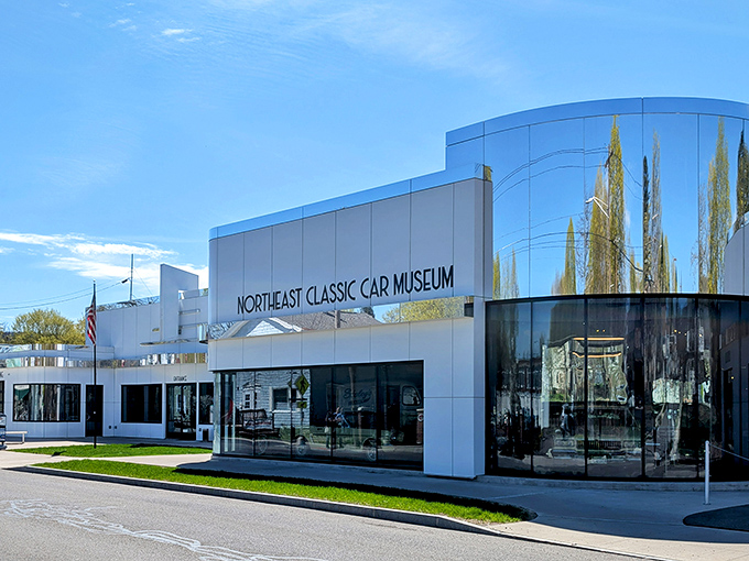 The sleek white exterior of the Northeast Classic Car Museum in Norwich belies the colorful automotive treasures waiting inside, like finding the Louvre in a small-town strip mall.