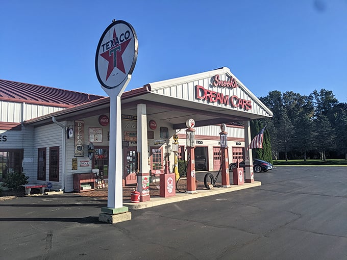 The vintage Texaco gas station façade welcomes visitors like a portal to America's automotive golden age, complete with those iconic red pumps.