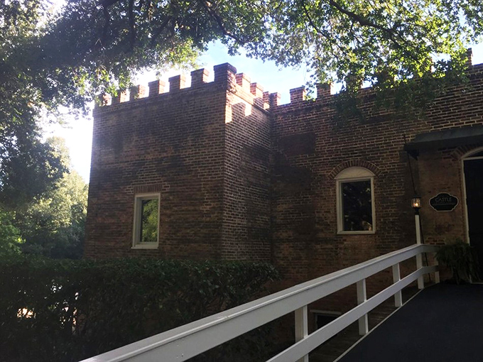 The castle's brick exterior with crenellated walls isn't just for show&mdash;it's your first clue that dinner tonight will be anything but ordinary.