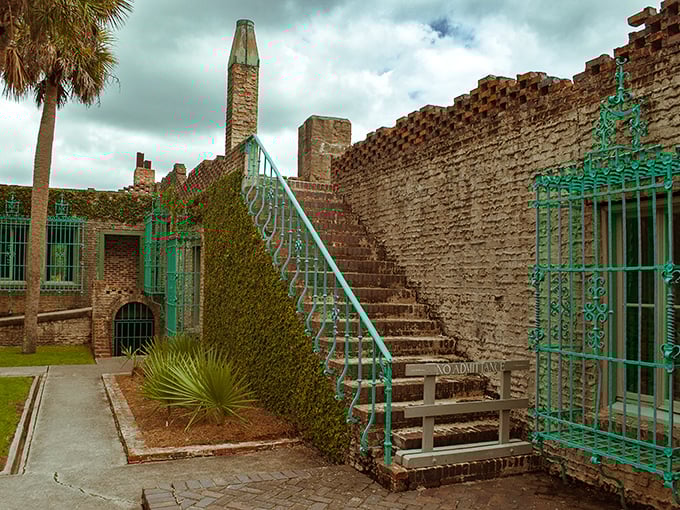 The vine-covered walls of Atalaya Castle create a striking contrast against South Carolina's blue skies, where Mediterranean dreams meet Palmetto State reality.