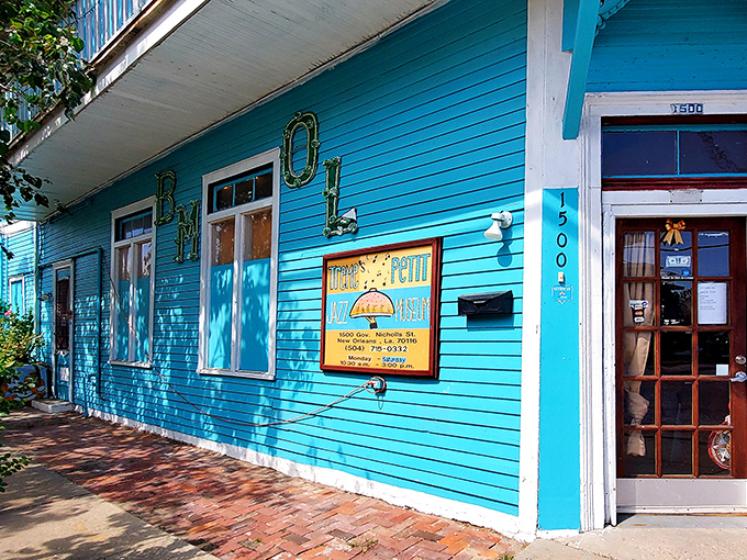 The vibrant blue exterior of Trem&eacute;'s Petit Jazz Museum stands out like a high note in a quiet melody, inviting curious passersby to discover the treasures within.