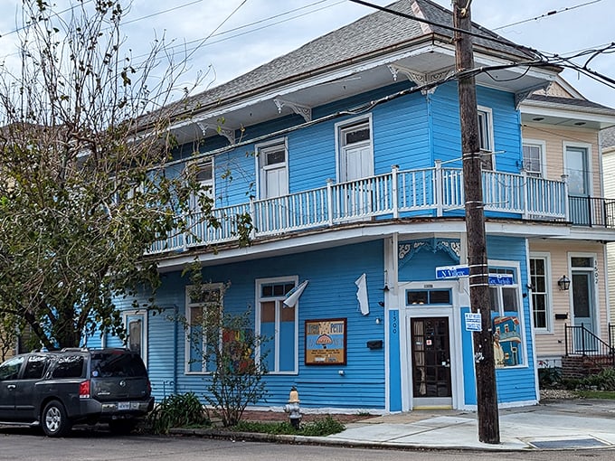 The vibrant blue exterior of Trem&eacute;'s Petit Jazz Museum stands out like a high note in a quiet melody, inviting curious passersby to discover the treasures within.