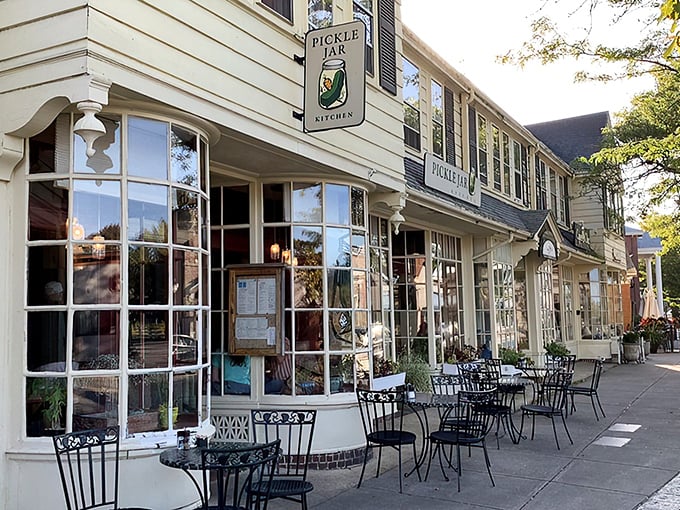 The charming yellow exterior of Pickle Jar Kitchen beckons like a culinary lighthouse on Falmouth's Main Street, promising comfort and creativity inside.