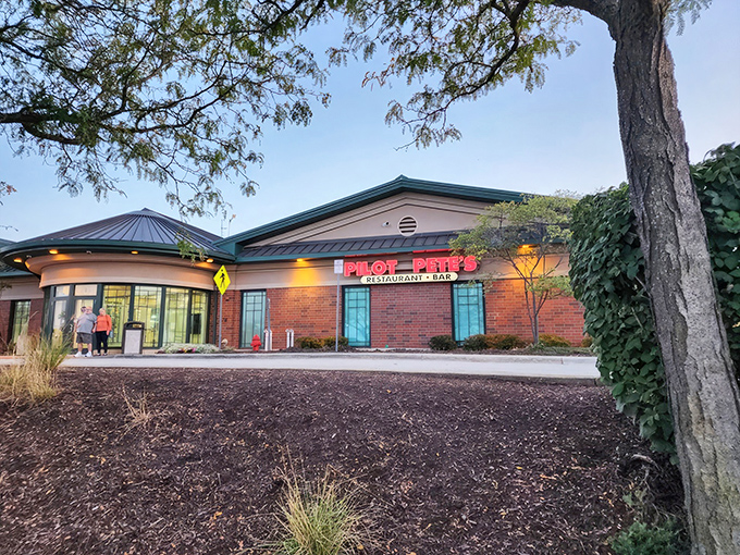 The unassuming exterior of Pilot Pete's in Schaumburg hides a wonderland of aviation treasures and culinary delights waiting inside.