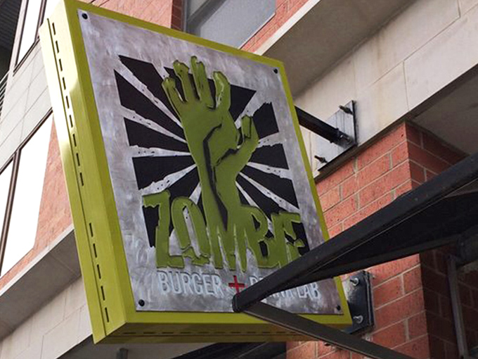 The unassuming exterior of Zombie Burger belies the apocalyptic culinary adventure within. Des Moines' East Village never looked so deliciously dangerous.