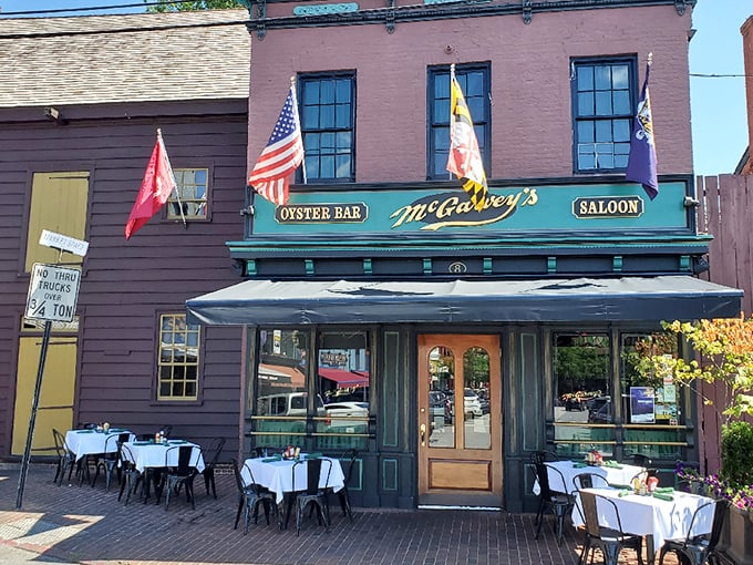 McGarvey's pink brick exterior with its signature green awning stands as a beacon for seafood lovers in historic downtown Annapolis.