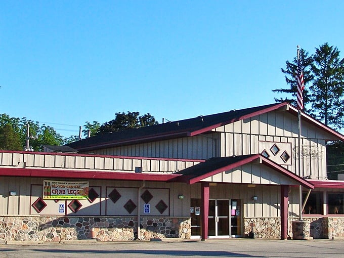 Clifford's vintage sign glows like a beacon for hungry travelers. This unassuming exterior hides Wisconsin's fish fry paradise within.