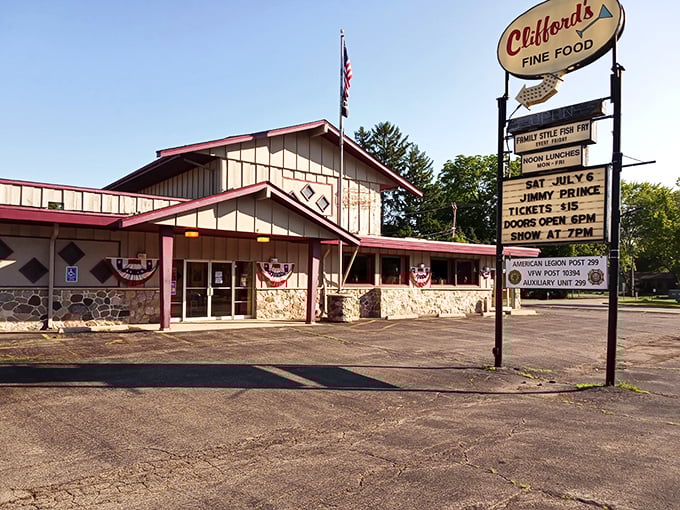 Clifford's vintage sign glows like a beacon for hungry travelers. This unassuming exterior hides Wisconsin's fish fry paradise within.