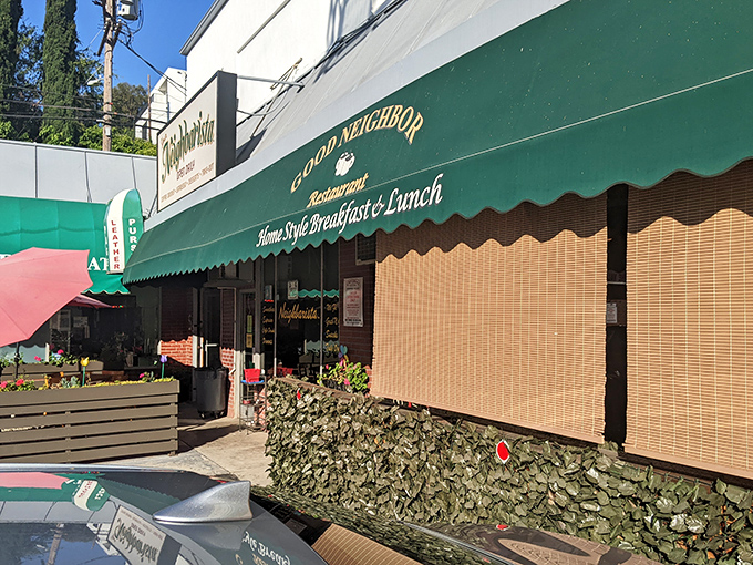 The green awning of Good Neighbor Restaurant beckons like an old friend on Ventura Boulevard, promising home-style comfort without the pretension.