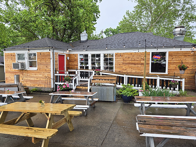 The unassuming gray exterior of Nashville Jam Co. is like finding a secret breakfast club where the password is "hungry" and everyone gets in.