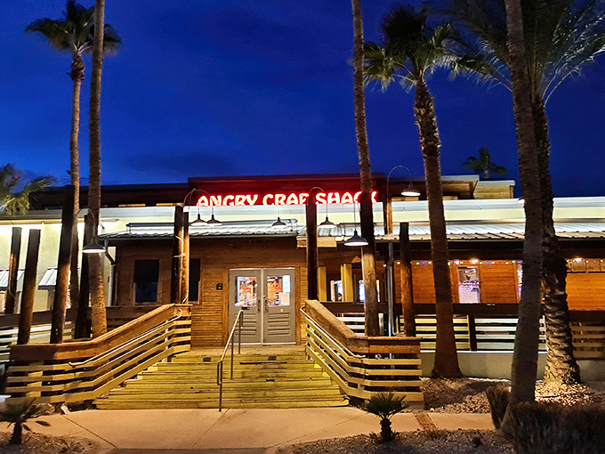 Palm trees and wooden ramps welcome you to seafood paradise&mdash;where the desert meets the ocean at Angry Crab Shack's inviting Henderson location.
