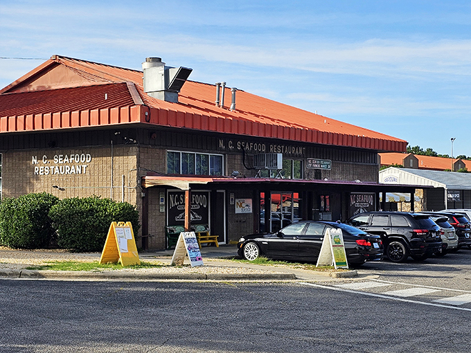 The unassuming exterior of N.C. Seafood Restaurant stands as a beacon for seafood lovers&mdash;architectural flair takes a backseat to what really matters: the food inside. 