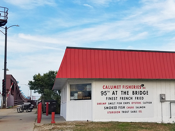 The iconic red-roofed shack stands proudly at 95th Street Bridge, a beacon of seafood excellence that's been drawing Chicagoans for generations.