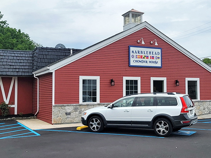 The iconic red clapboard exterior of Marblehead Chowder House stands like a New England lighthouse beckoning seafood lovers in the Pennsylvania countryside.