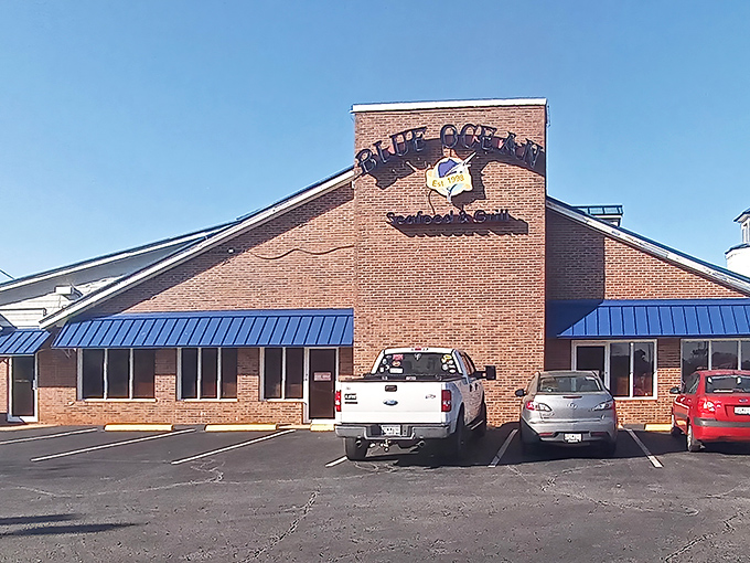 The distinctive blue roof and octagonal tower of Blue Ocean Seafood Restaurant stand as a beacon for hungry travelers seeking seafood salvation in Clinton.