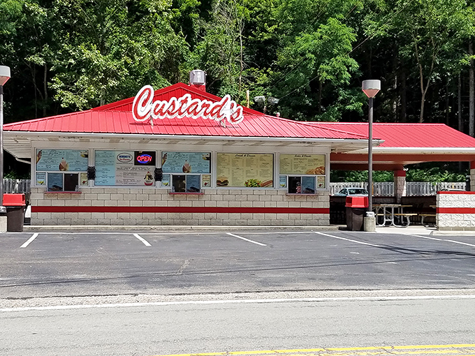 The neon glow of Custard's against a twilight sky isn't just signage&mdash;it's a beacon of hope for dessert lovers seeking frozen nirvana.